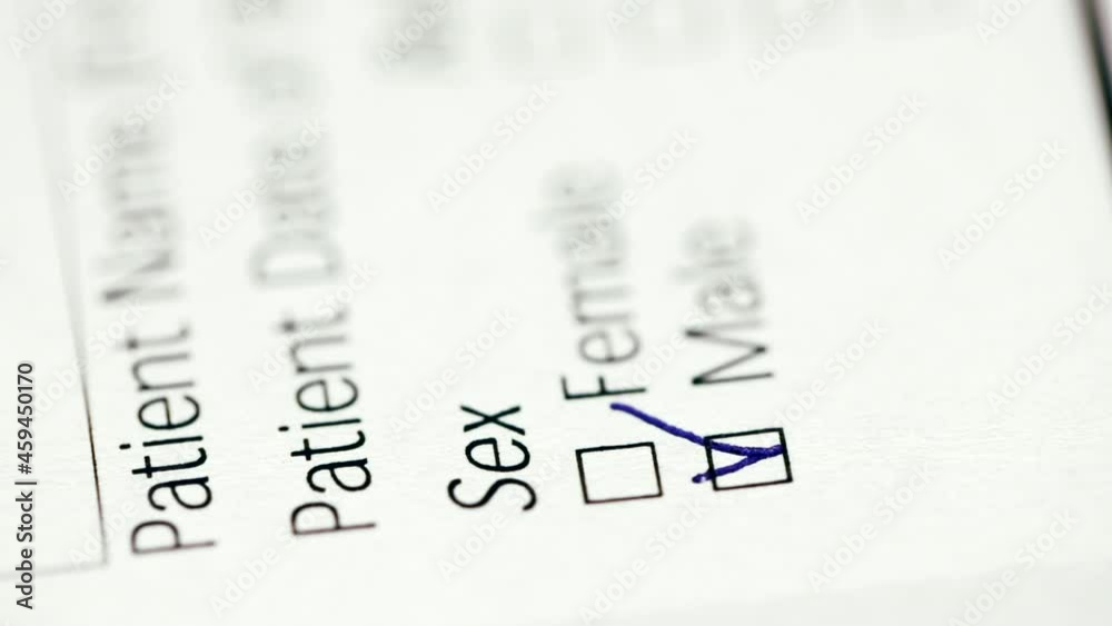Person marking gender checkbox in a form Stock Video | Adobe Stock
