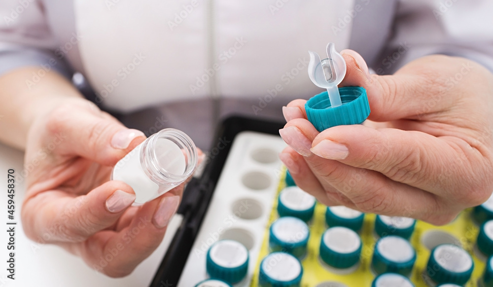 Contact lenses, lens selection. Ophthalmologist holds contact lenses in ...