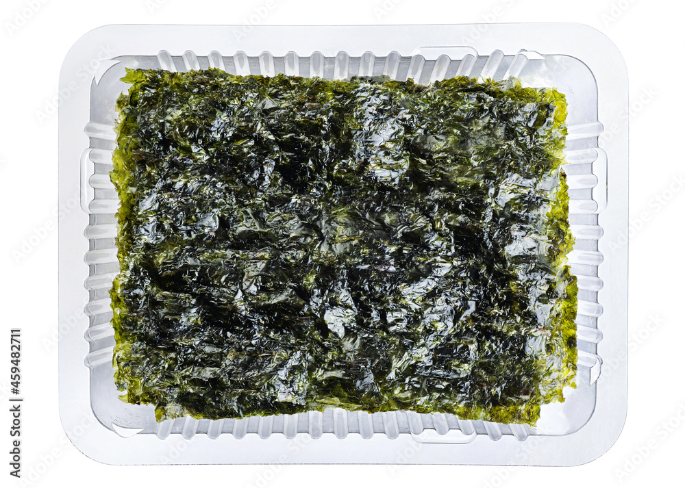 Crispy nori seaweed korean snack in a plastic container isolated on ...