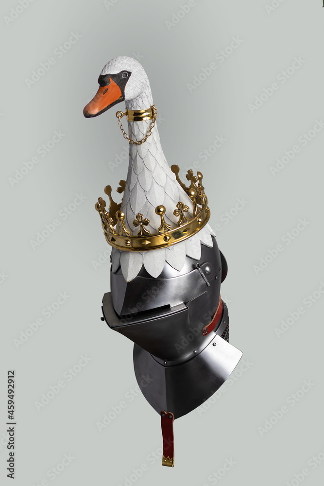 Medieval knightly Milanese helmet with a heraldic kleinod in the form ...