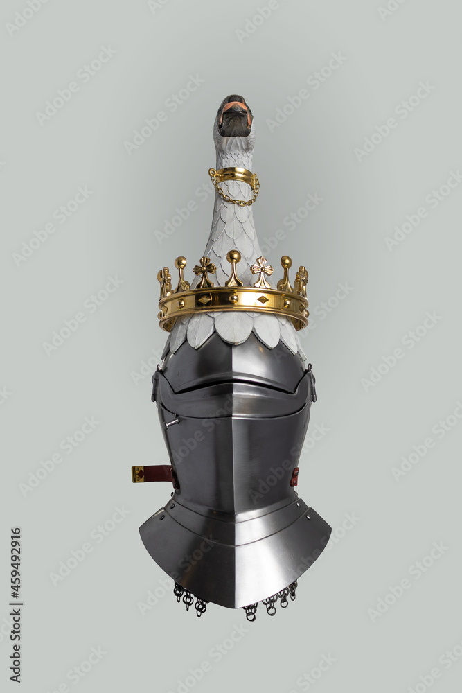 Medieval knightly Milanese helmet with a heraldic kleinod in the form ...