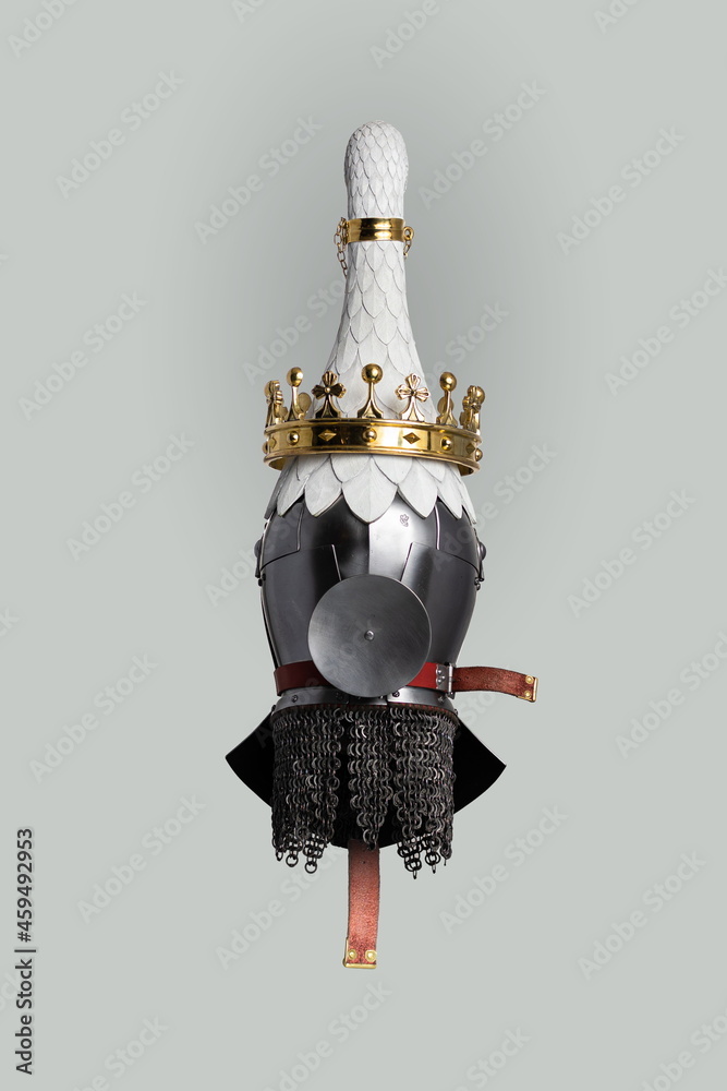 Medieval knightly Milanese helmet with a heraldic kleinod in the form ...