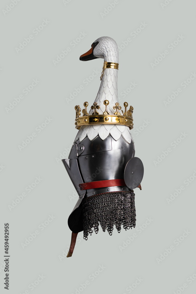 Medieval knightly Milanese helmet with a heraldic kleinod in the form ...
