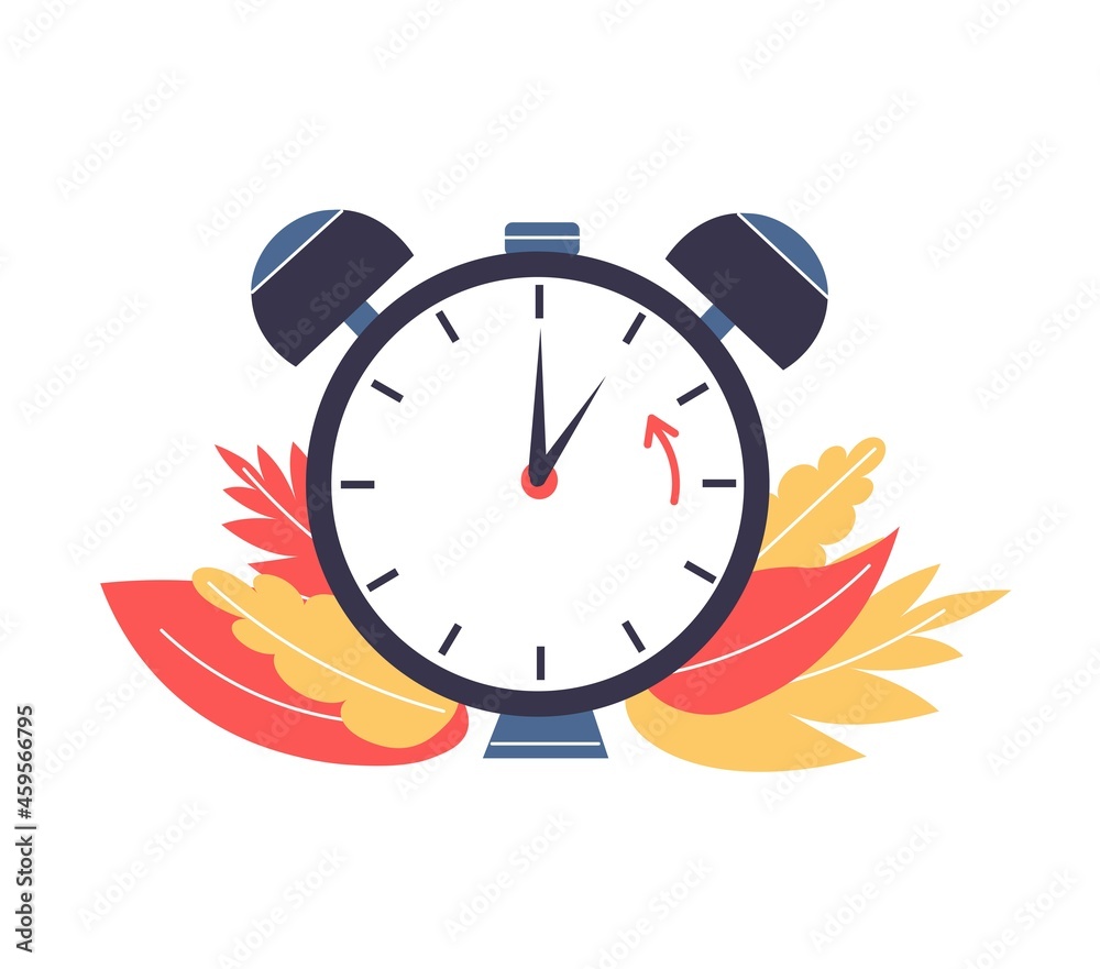 Daylight saving time fall back concept. Clock with autumn leaves ...