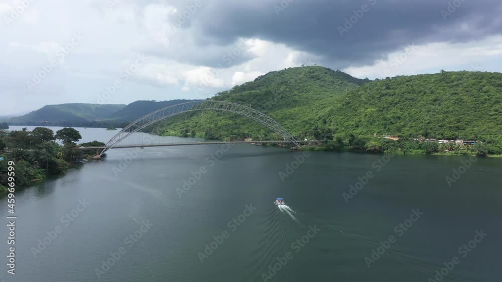 Aerial Adome bridge boat Volta River Ghana Africa. River system in West ...