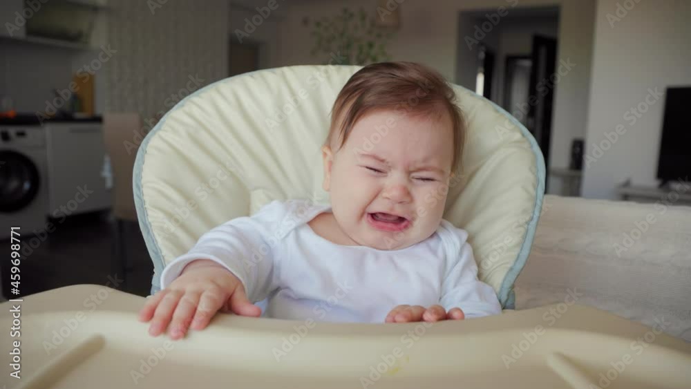 4k footage Angry little baby with sad expressions, screaming and crying ...