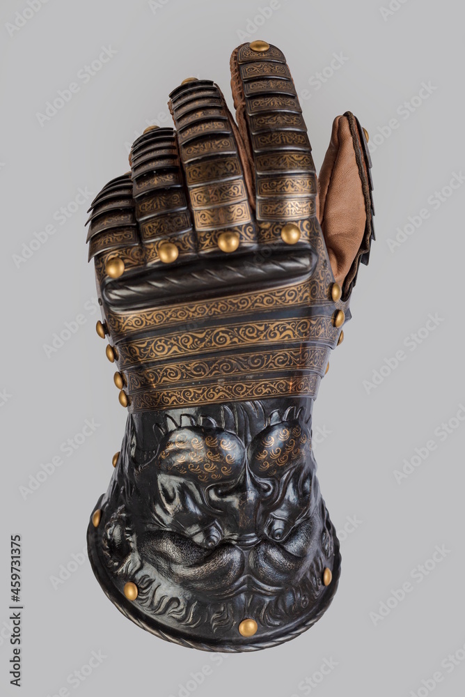 Medieval knightly brown plate gauntlet from Italian armor, in the form ...
