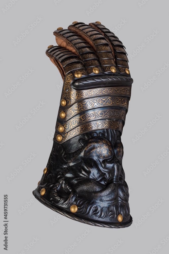 Medieval knightly brown plate gauntlet from Italian armor, in the form ...