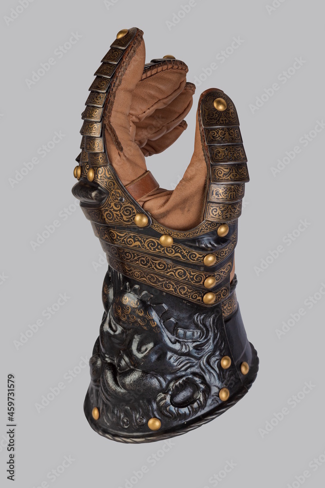 Medieval knightly brown plate gauntlet from Italian armor, in the form ...