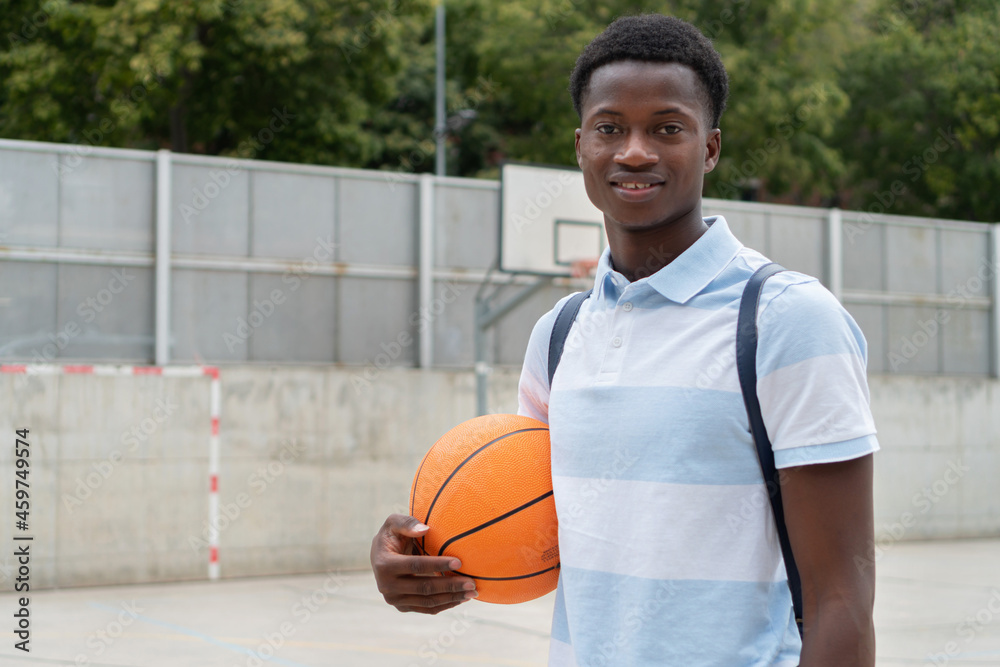 African American student back to school. Portrait of a Black teenager ...