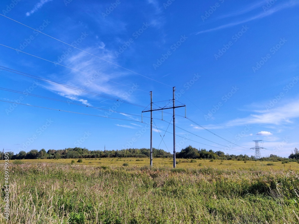 power lines on the field. electricity. power transmission towers Stock ...
