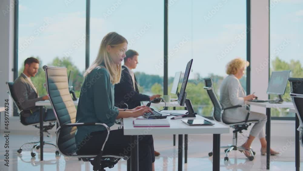 Slide and pan footage of short speak between smiling positive ...