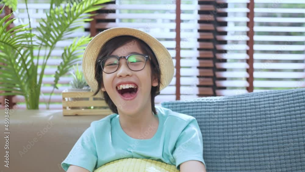 happiness asian child boy greeting hand wave to say hi video portrait ...