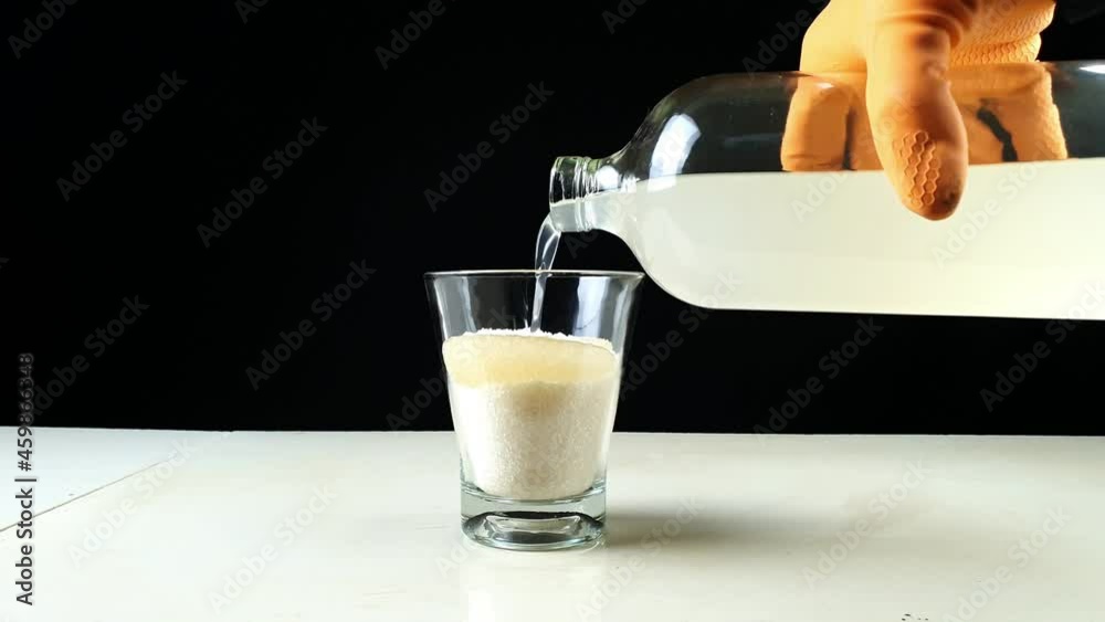 Sulfuric Acid and Sugar Chemical Reaction. Dehydration reaction of sugar by concentrated ...