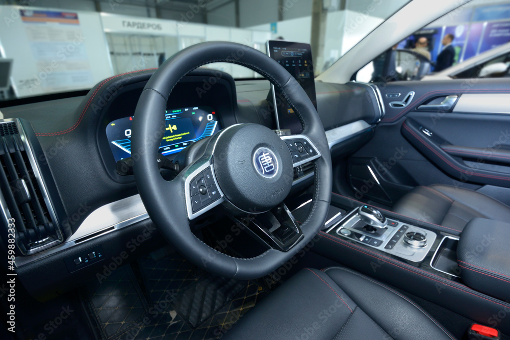 Interior of an electric car BYD Tang ev dashboard steering wheel seats ...