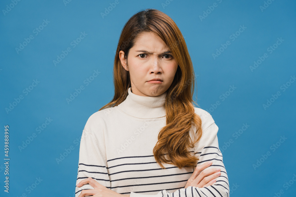 Young Asia lady with negative expression, excited screaming, crying ...