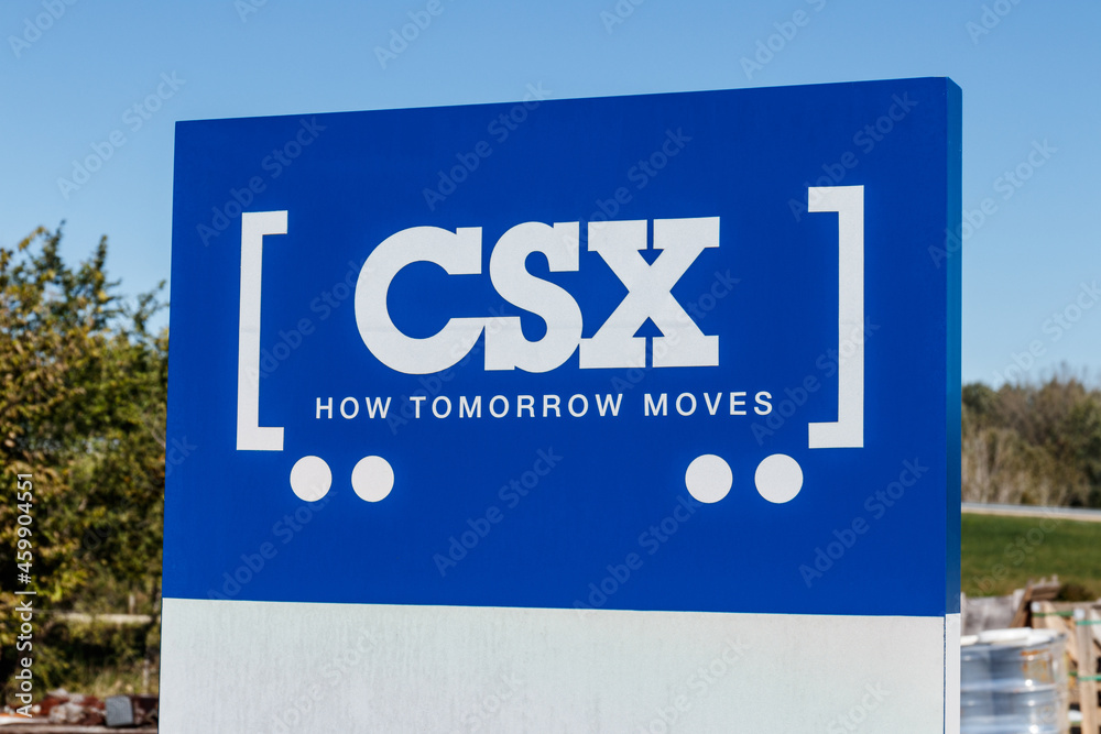 CSX Logo and signage. CSX operates a Class I train railroad in the US ...