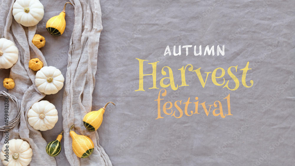 Autumn harvest festival text with natural pumpkins and quince fruit ...