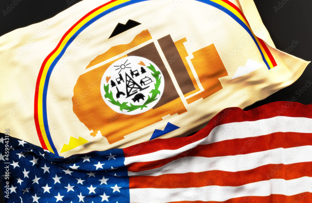 Flag of Navajo along with a flag of the United States of America as a ...
