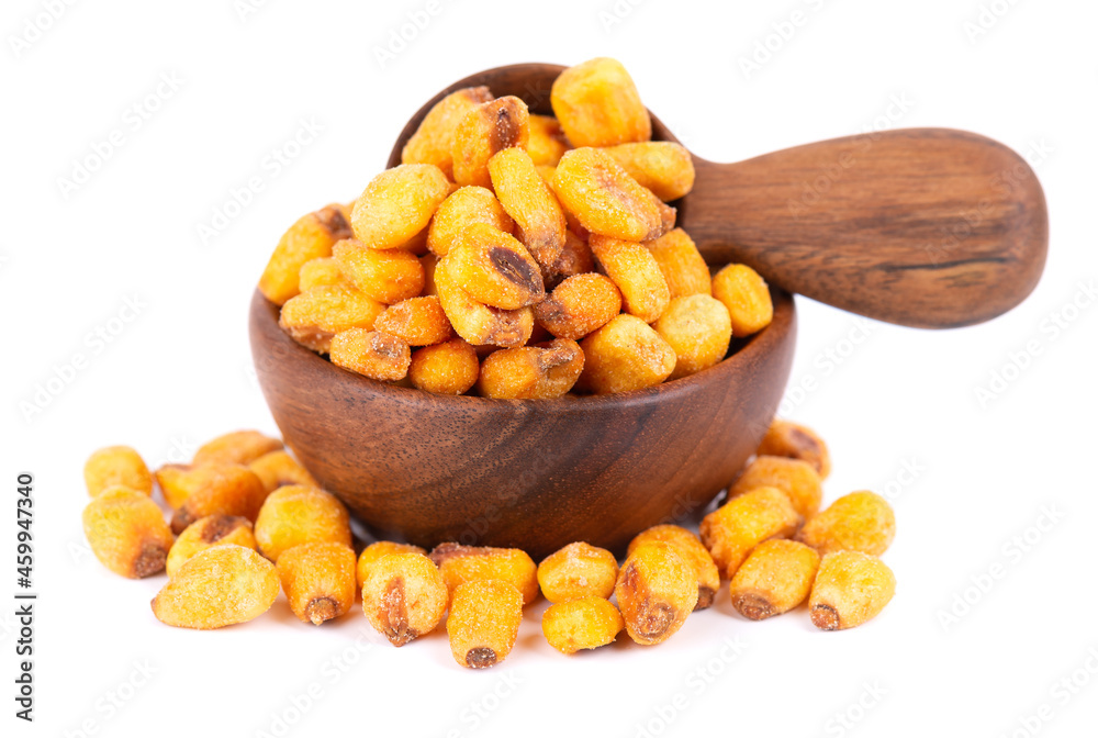 Roasted salted corn nuts in wooden bowl and spoon, isolated on white ...