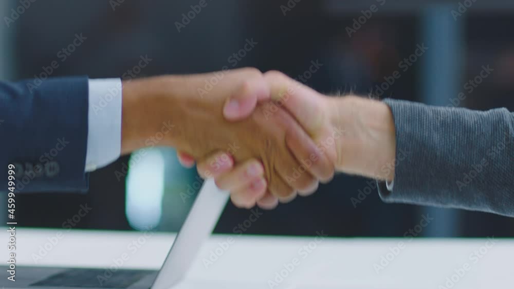 Close-up footage of handshaking. Males shake hands as proof of their ...