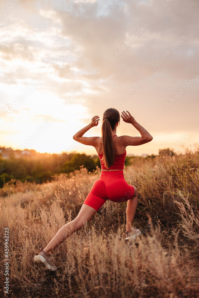 Fitness woman ready for running at sunset or sunrise on beach. Female ...