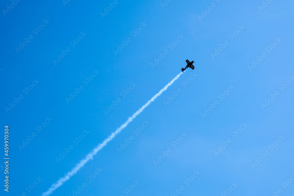Overhead flying aircraft. Aircraft in formation during an aerobatics ...