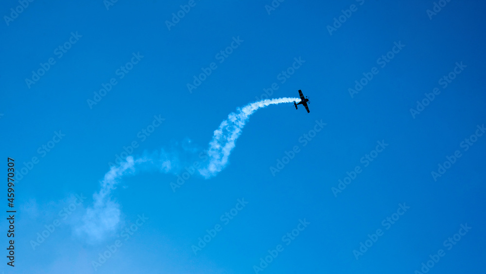 Overhead flying aircraft. Aircraft in formation during an aerobatics ...