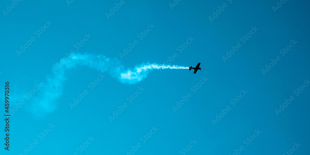 Overhead flying aircraft. Aircraft in formation during an aerobatics ...