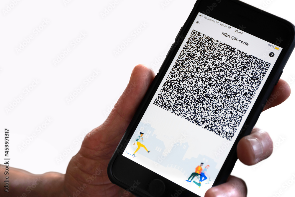 AMSTERDAM: NETHERLANDS - JULY 29 2021: Hand holding smartphone with QR ...