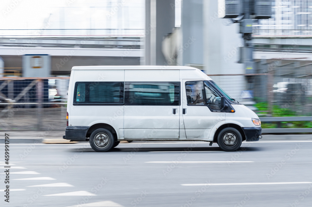Ford Transit Third generation in the city street. Side view of white ...