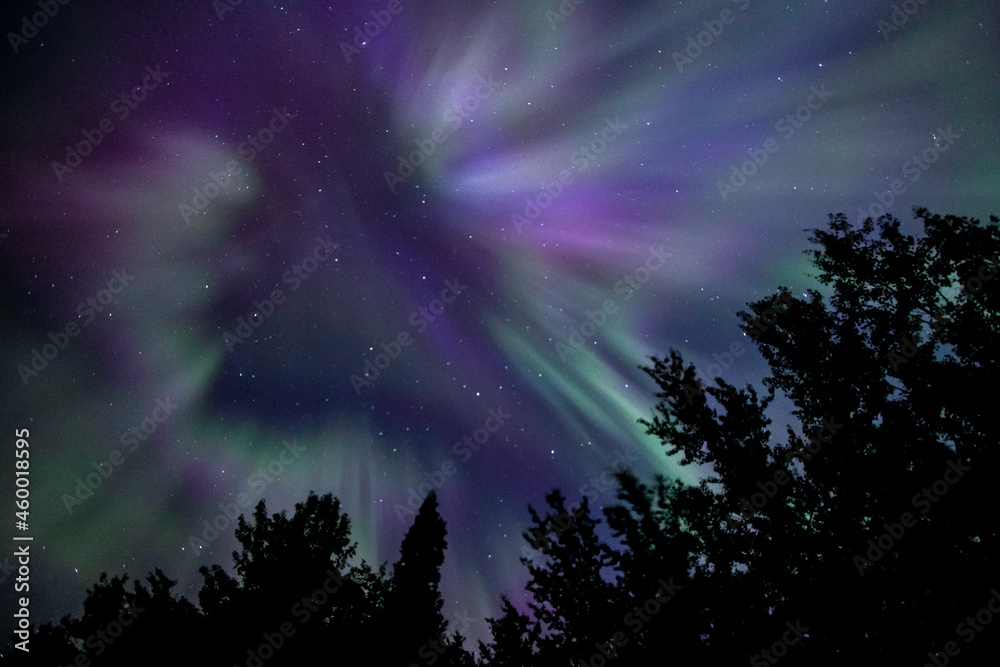 Northern Lights Aurora Borealis Coronal Hole erupts over a lake in ...