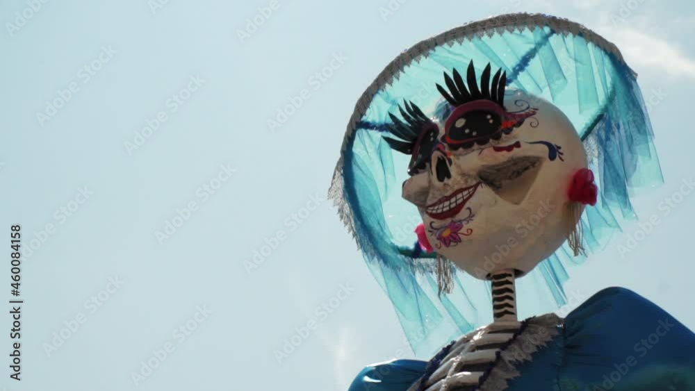 daylight close-up of a beautiful traditional statue of a female catrina ...