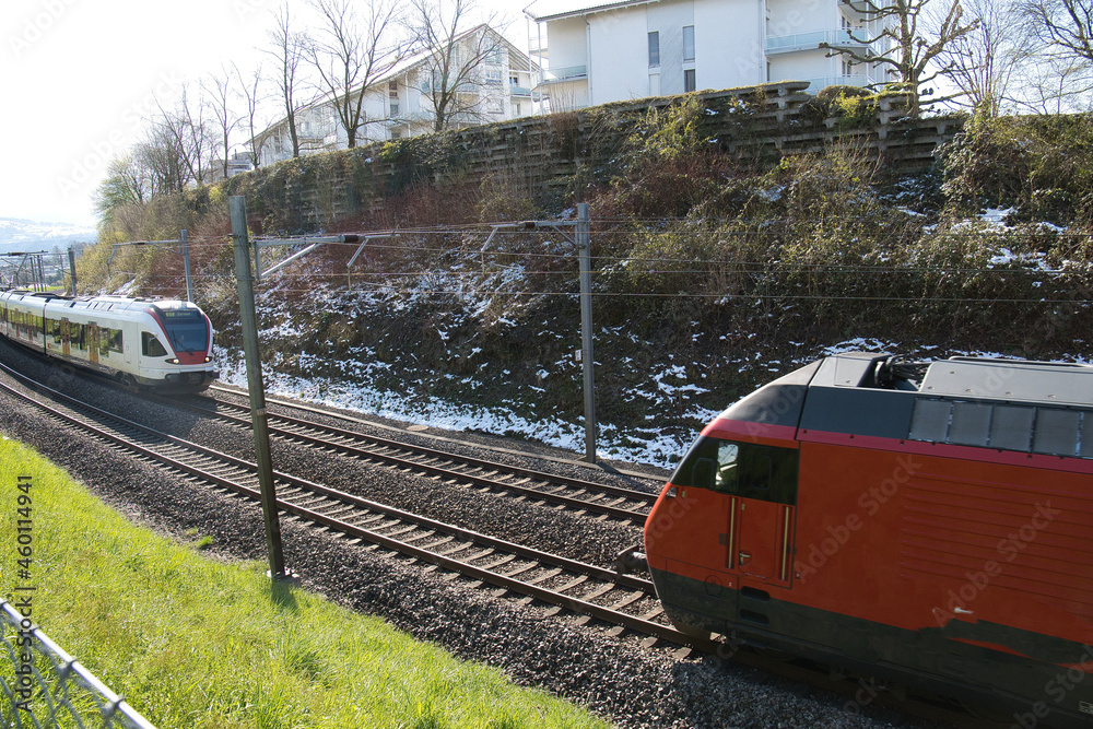Top view of an electric locomotive and modern train going in opposite ...