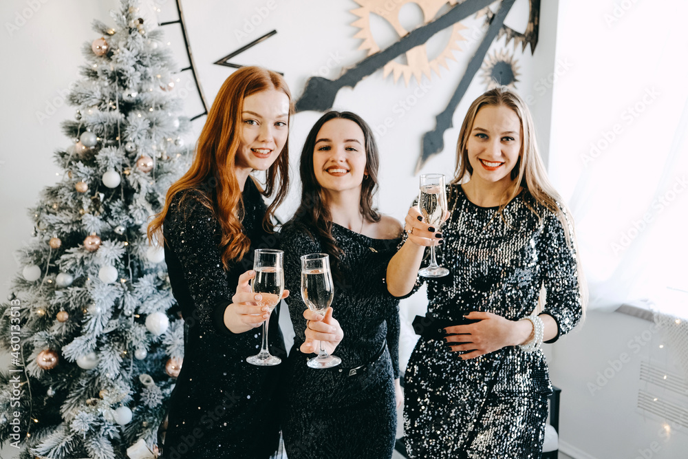 Cheers, New Year Eve, Christmas Celebration. Three partying girls ...