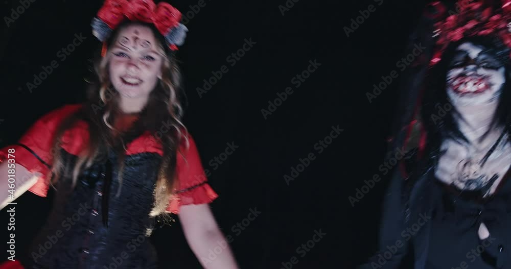 Sabbath witches whirling their hands at night in the woods to conjure ...