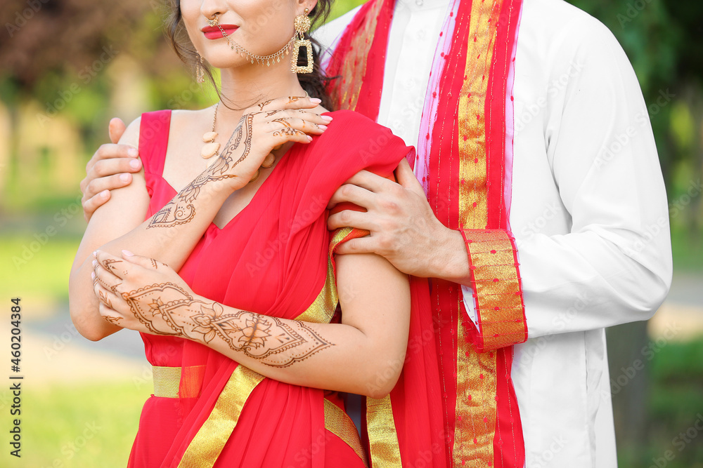 Beautiful Indian wedding couple outdoors Stock Photo | Adobe Stock