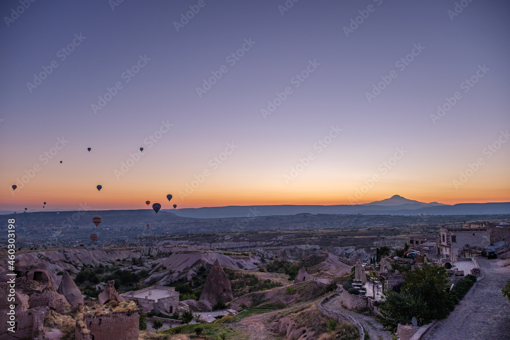 Cappadocia balloon tour , fairy chimneys and caves Stock Photo | Adobe ...