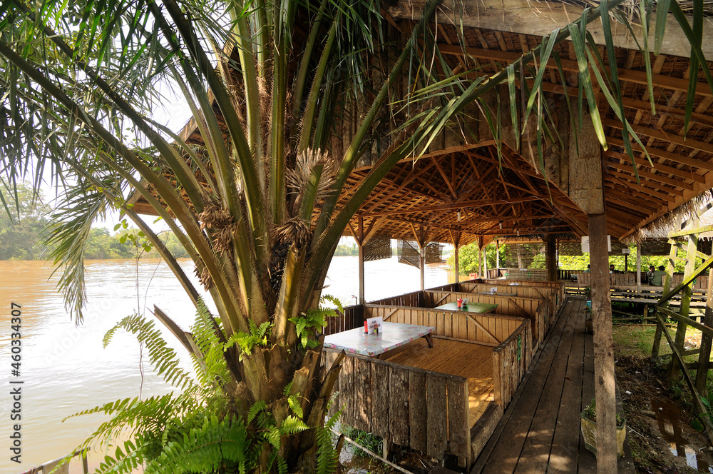 View of riverside dining on at raditional restaurant next to Kahayan ...