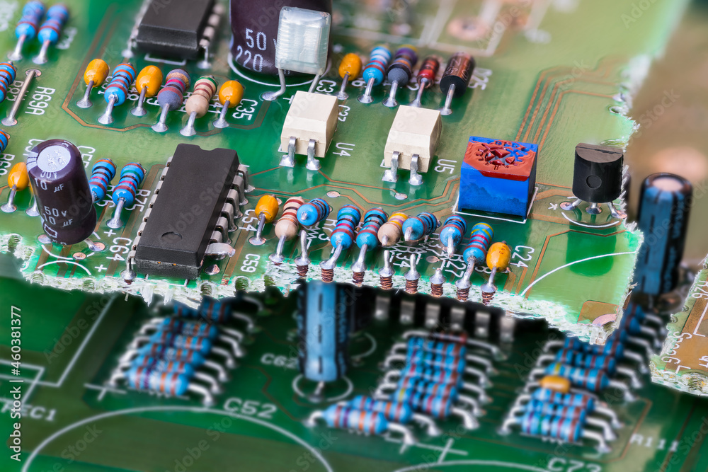 Foto de Closeup of electronic waste of broken green printed circuit ...