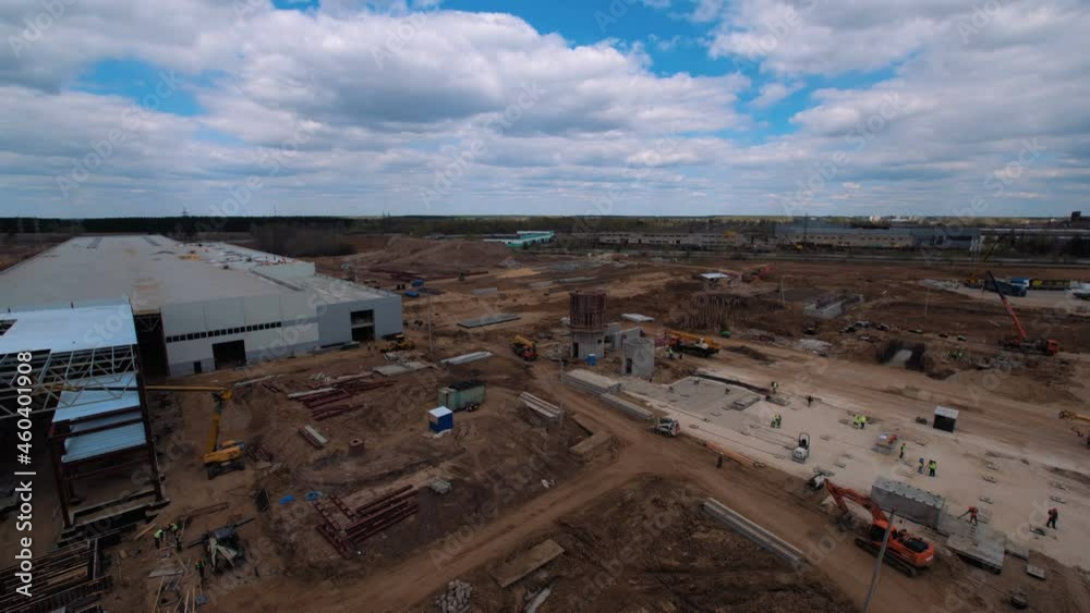 At construction site where a new, modern plant is being built, a lot of ...