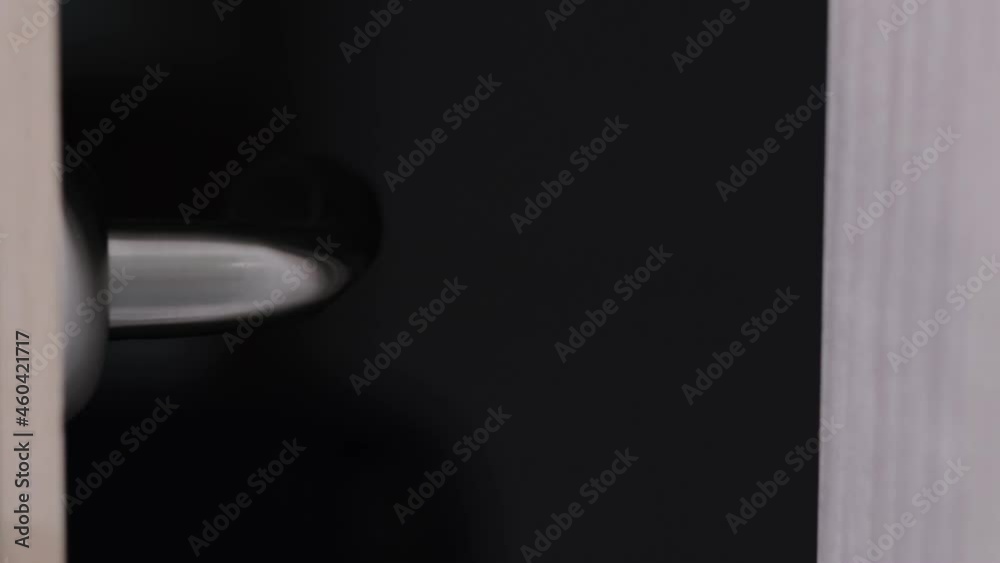 Vidéo Stock Light from the window of the house in the dark evening time ...