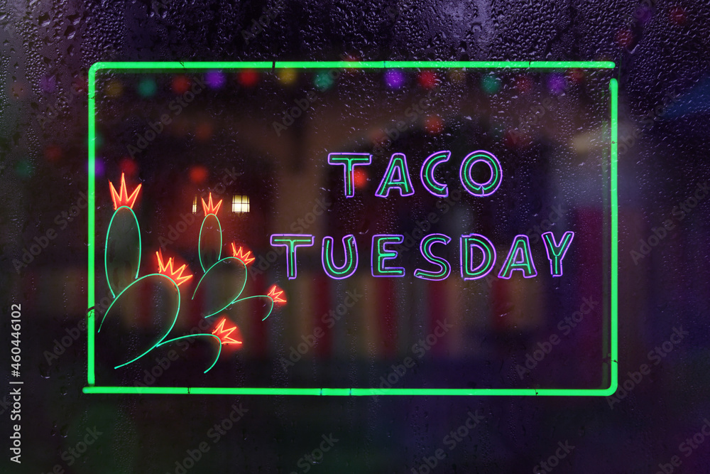 Vintage Taco Tuesday Neon Sign in Rainy Window of Mexican Restaurant ...