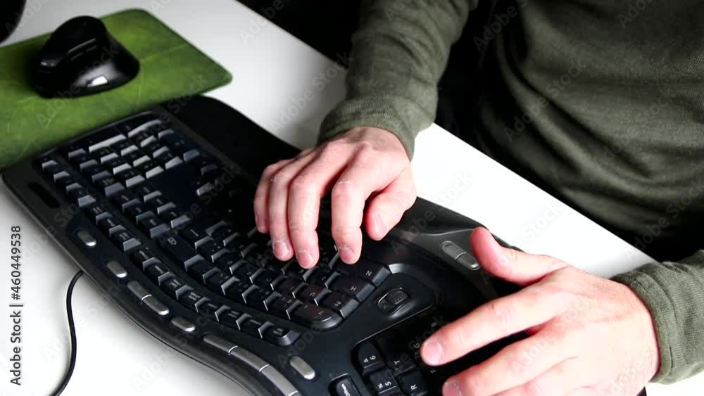 Stressed home office man using fidget spinner for stress relief while ...