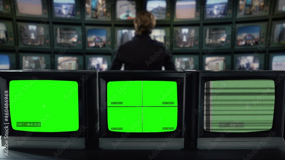 Control Room Man Watching CCTV Monitors Green Screen Security Cameras ...