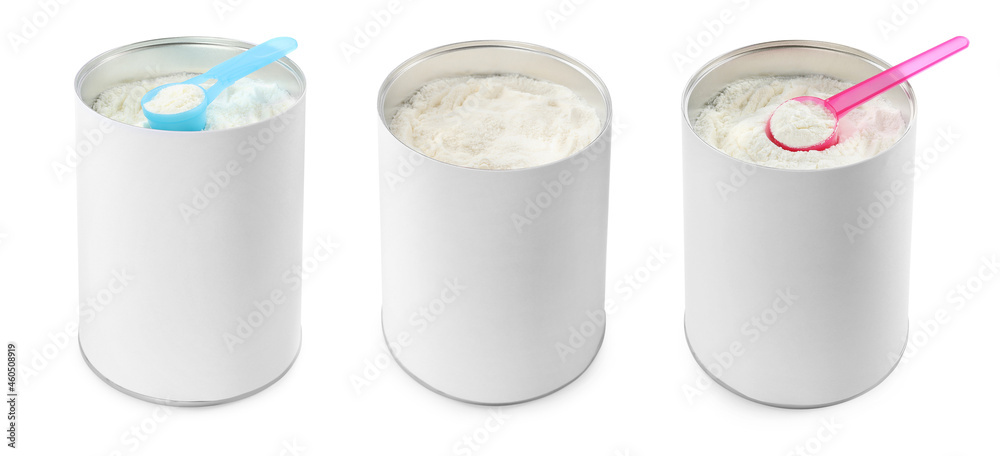Set with cans of powdered infant formula with scoops on white ...