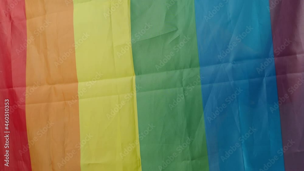 LGBTQ flag represent homosexual. Gay pride rainbow flag waving. lgbtq ...