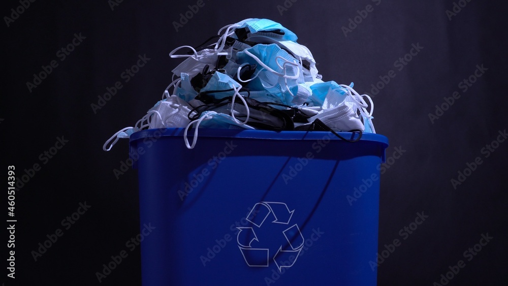 Discarded medical masks waste due coronavirus. Pile of used surgical ...