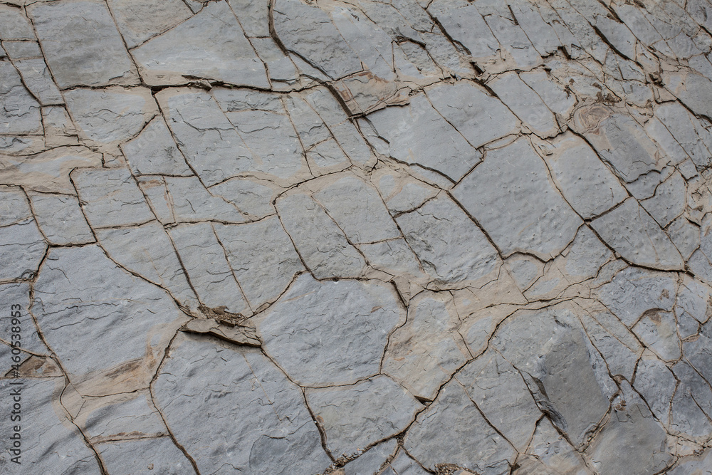 Texture of dry cracked stone natural mineral layered patterns in ...