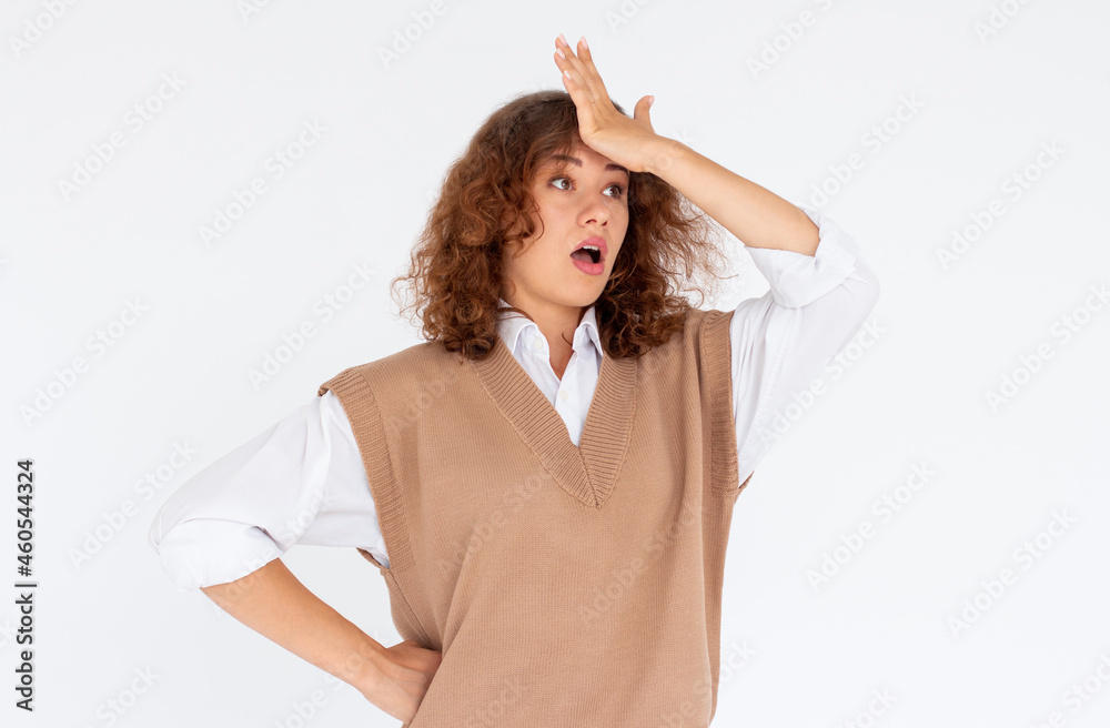 Closeup portrait silly woman, slapping hand on head having duh moment ...